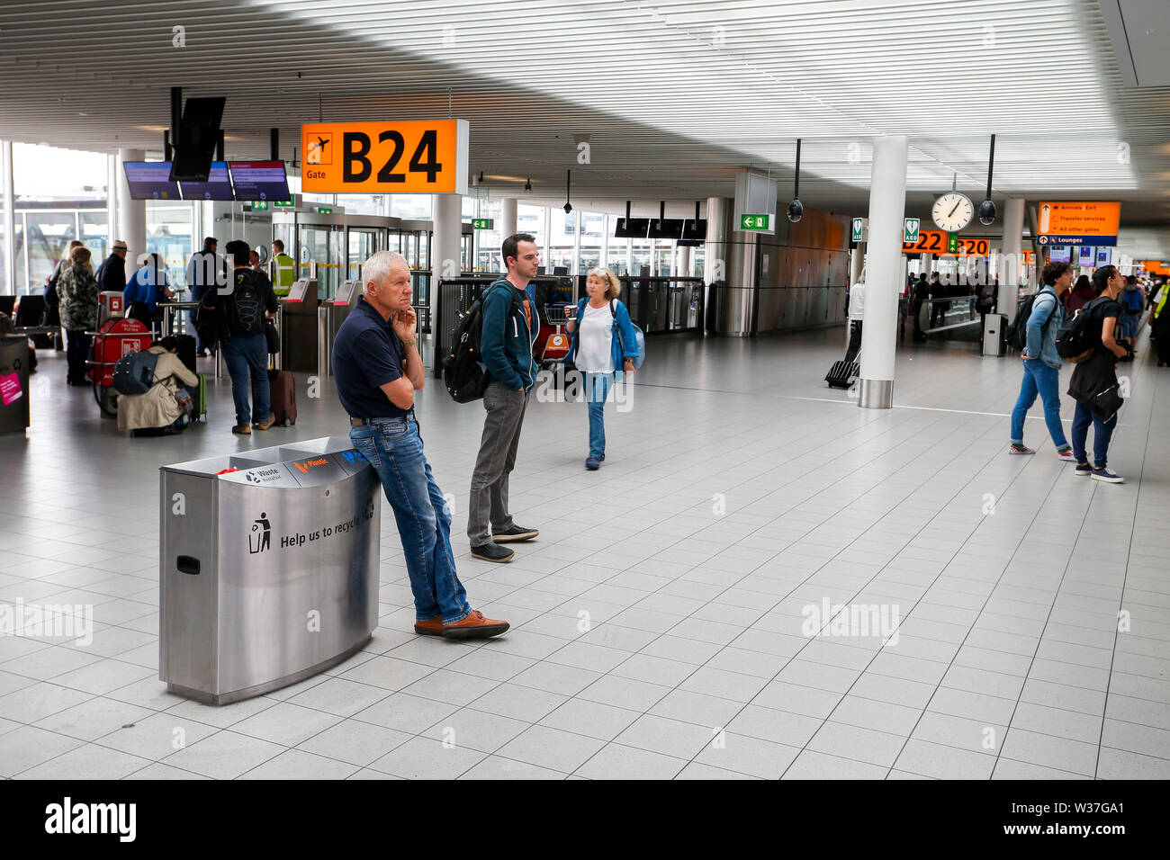 SCHIPHOL, 13-07-2019, Schiphol Airport Air port Airfield. Trashcan with man sitting on the ...