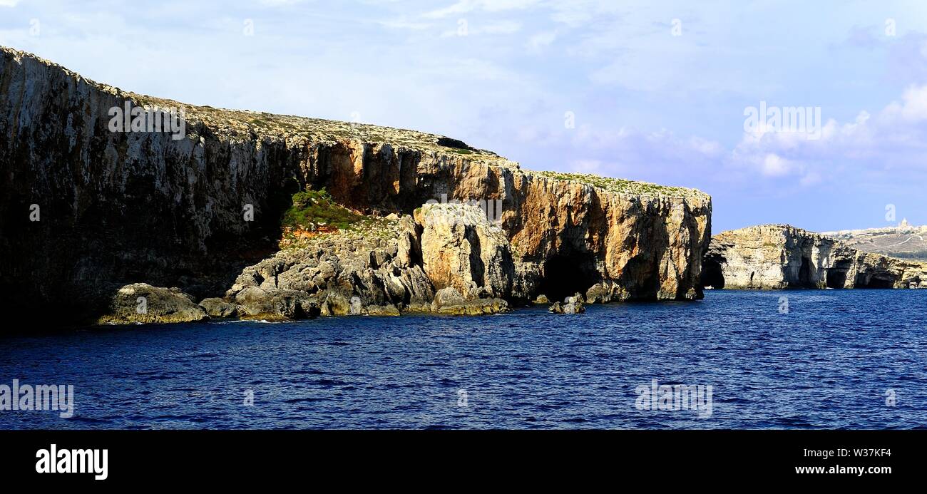 Malta - 12th October 2018:Sunlight on Smugglers Cave Stock Photo - Alamy