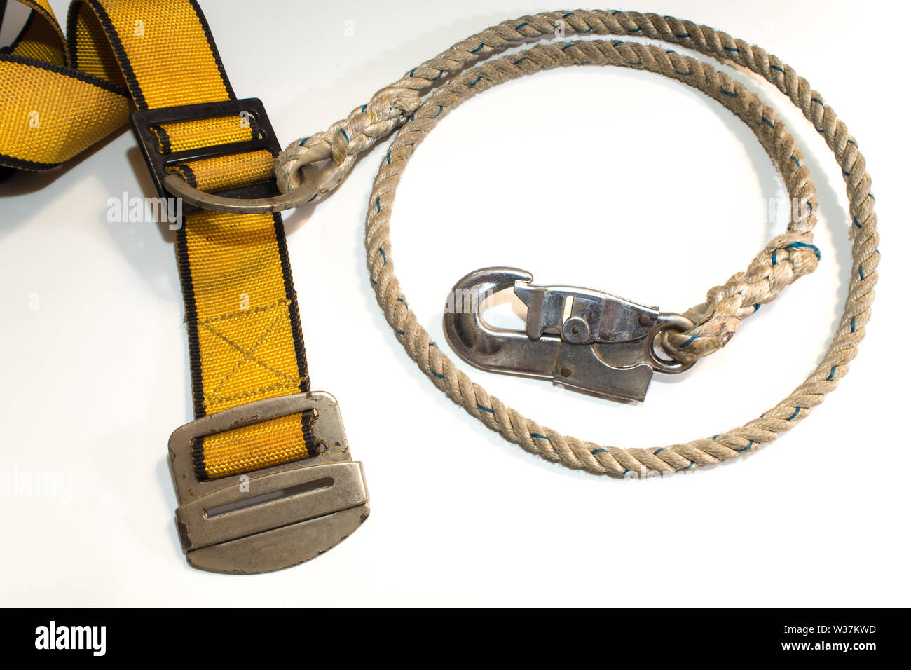 Hook and rope with Yellow belt of Safety Equipment Stock Photo - Alamy