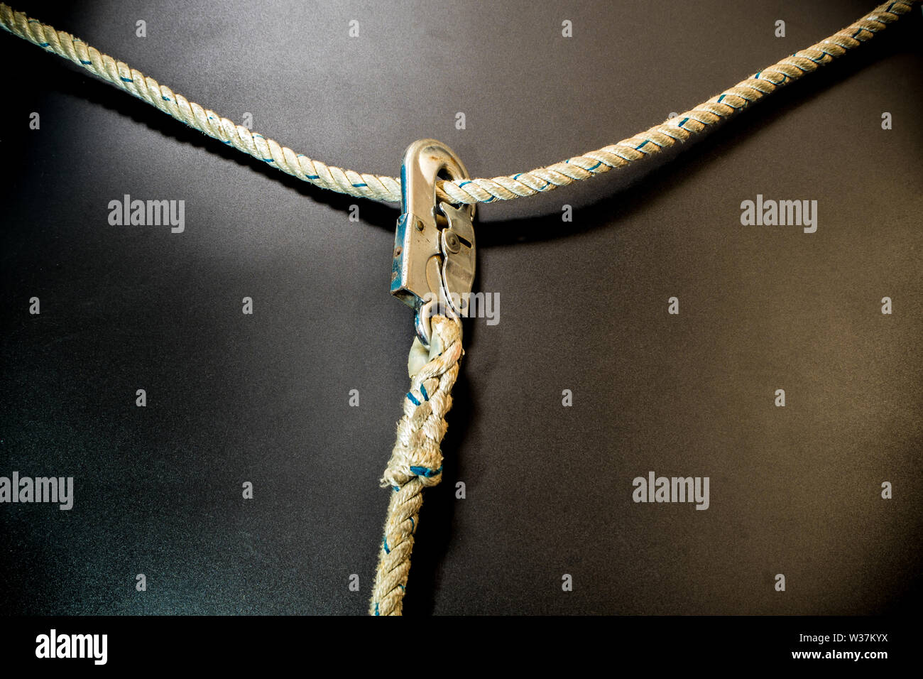 Hook and rope of Safety Equipment hang on rope Stock Photo - Alamy