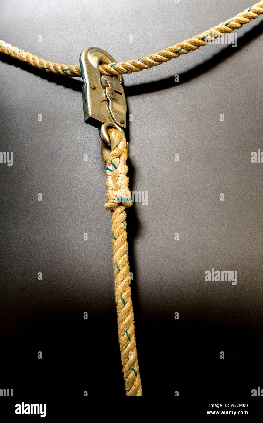 Hook and rope of Safety Equipment hang on rope Stock Photo - Alamy