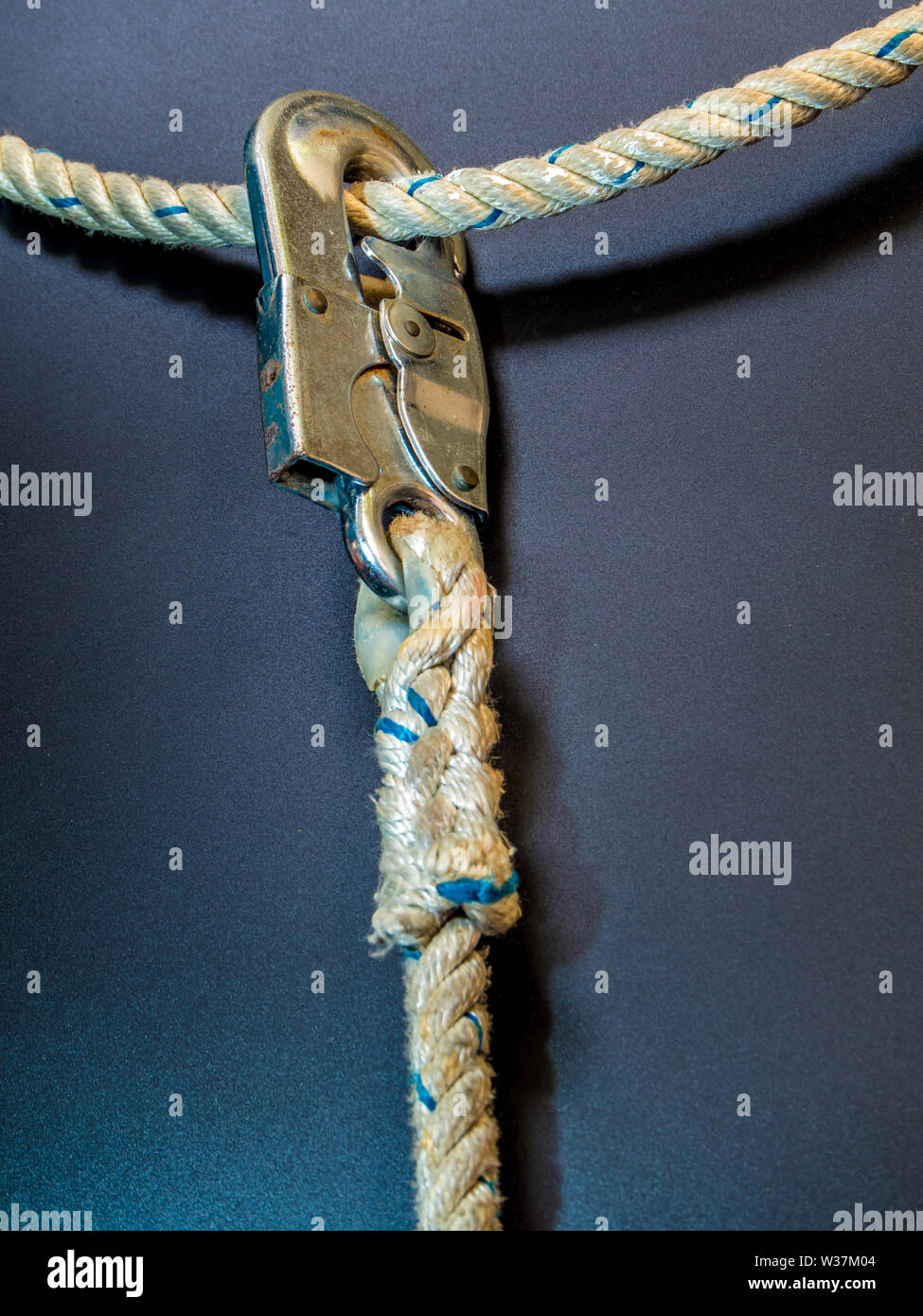 Hook and rope of Safety Equipment hang on rope Stock Photo - Alamy