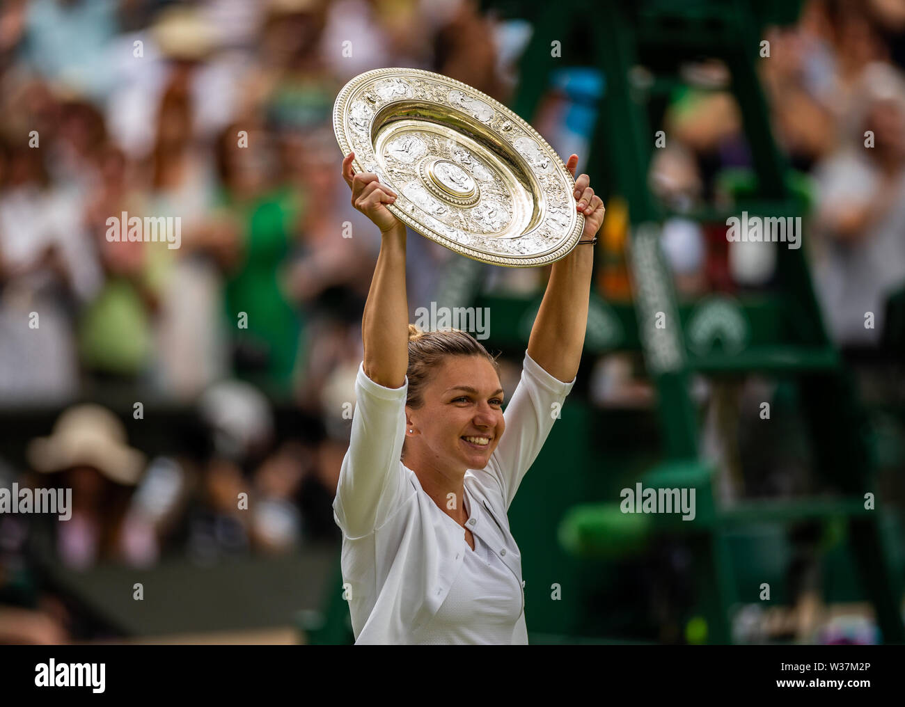 Simona Halep celebrates with the trophy after winning the women's ...