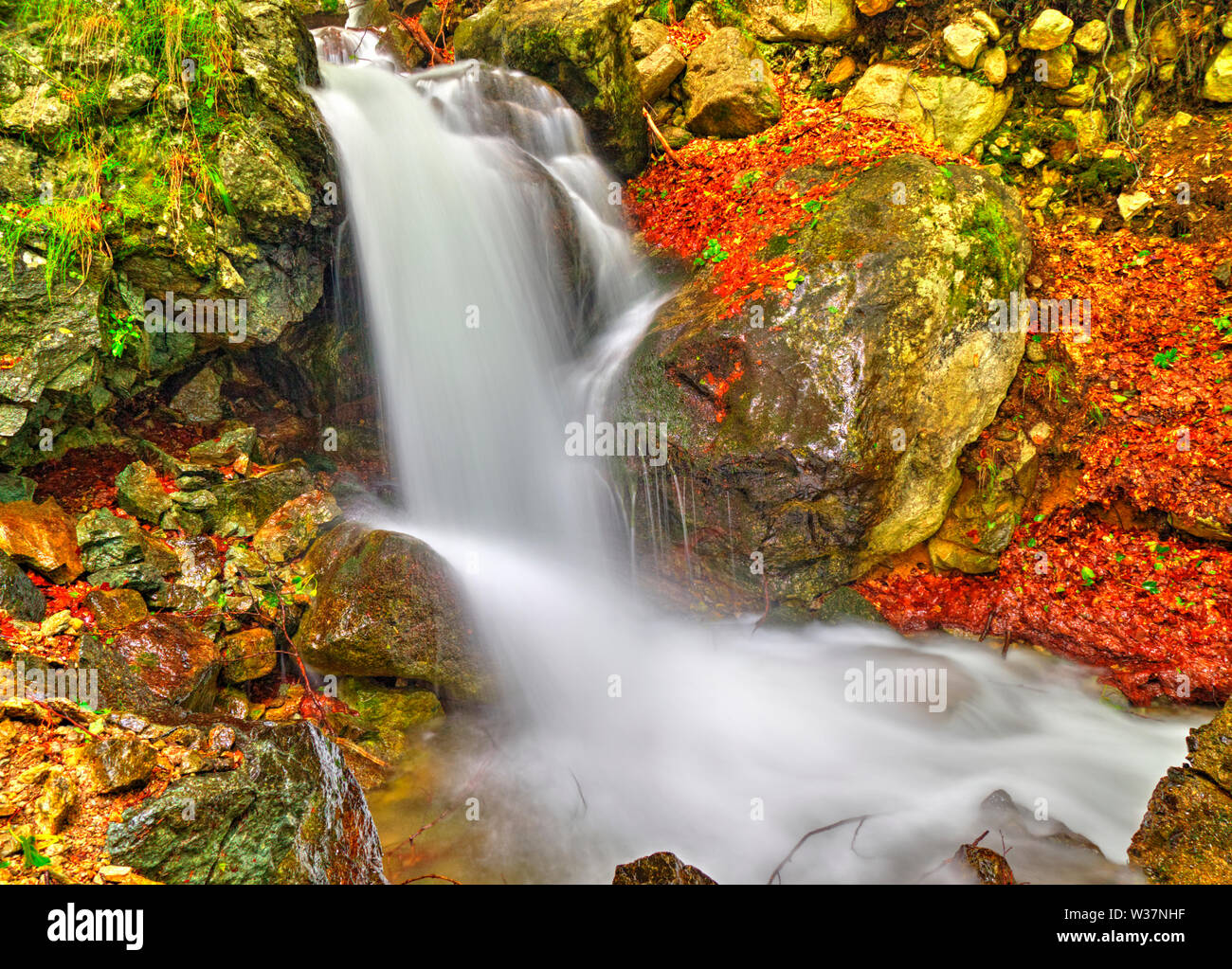 Beautiful landscape with waterfall in the mountain Stock Photo - Alamy