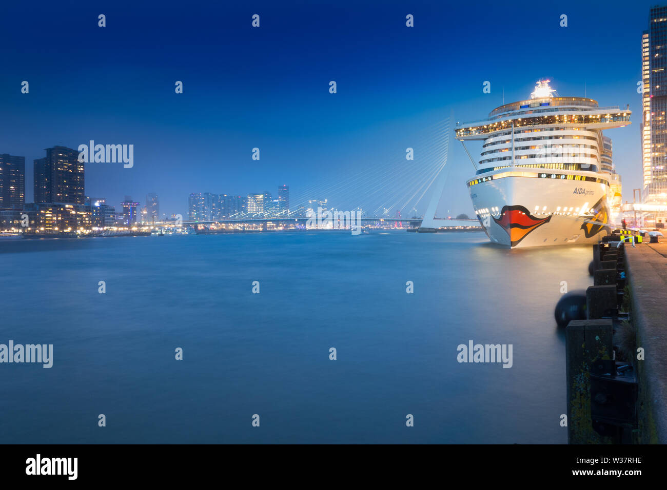 A cruise ship is anchoring in Rotterdam. It is the glowing Aida Prima ...