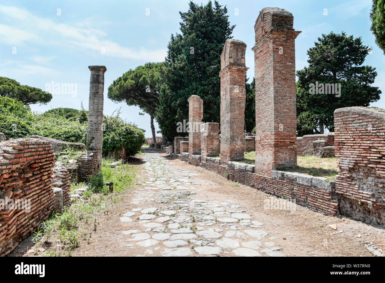 Roman empire street view with ruins and roman columns and typical ...