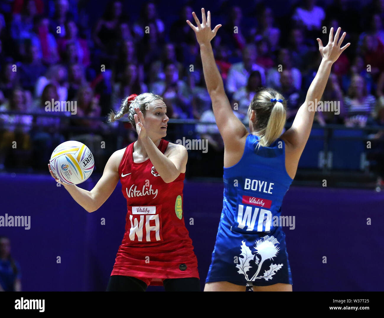 England's Natalie Panagarry (left) and Scotland's Kelly Boyle battle ...