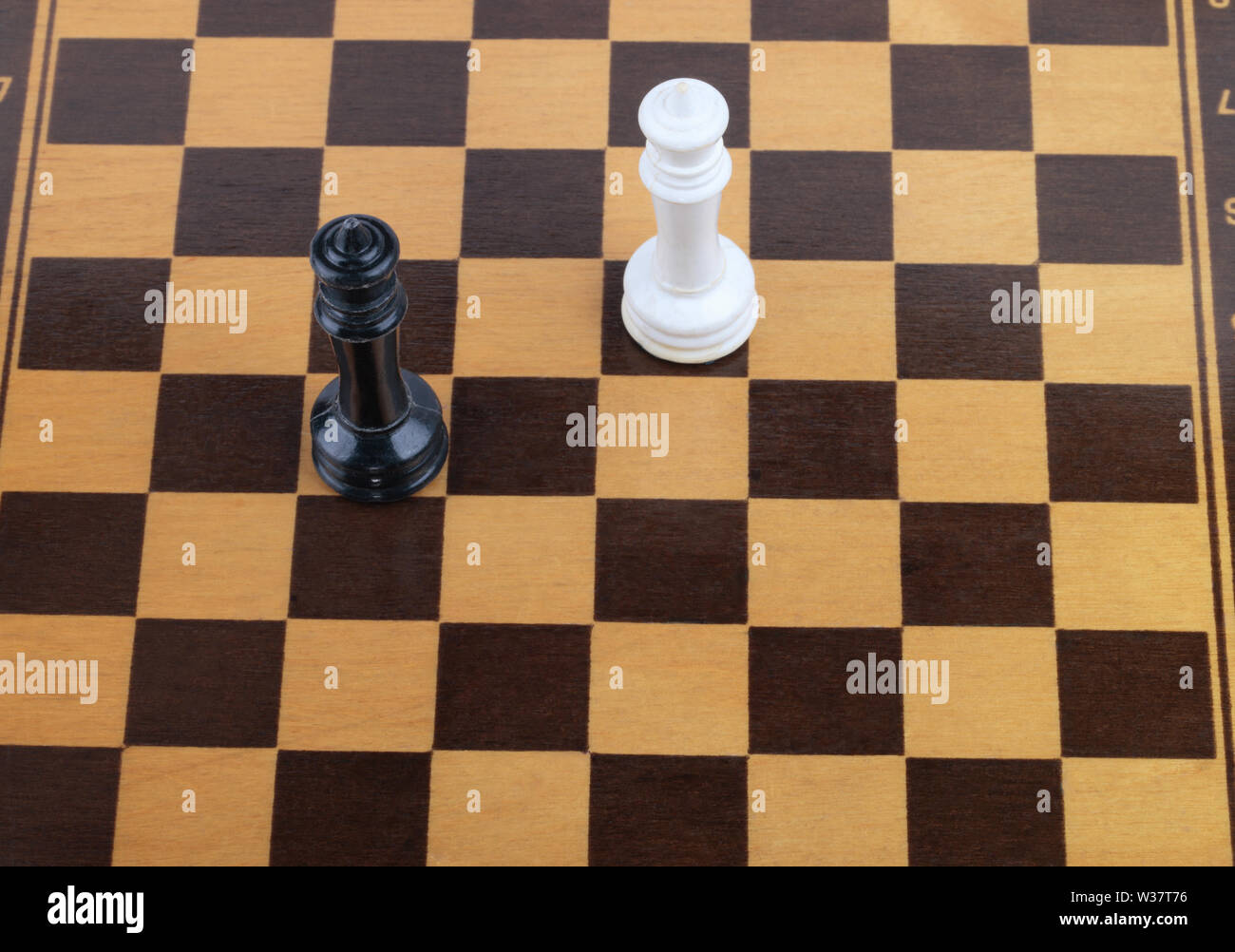 wooden checkerboard with figures Stock Photo - Alamy