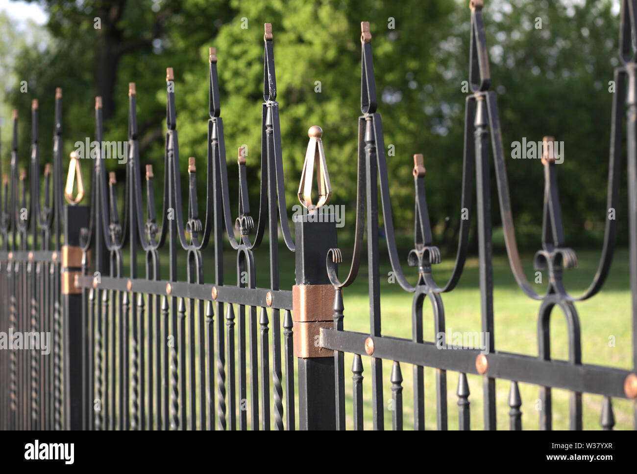 fence with gold decoration at day Stock Photo - Alamy