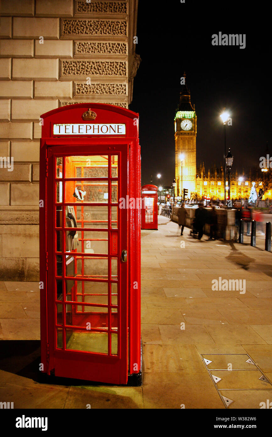 Iconic Red Telephone Booth and Big Ben Clock Tower at Night. Motion ...