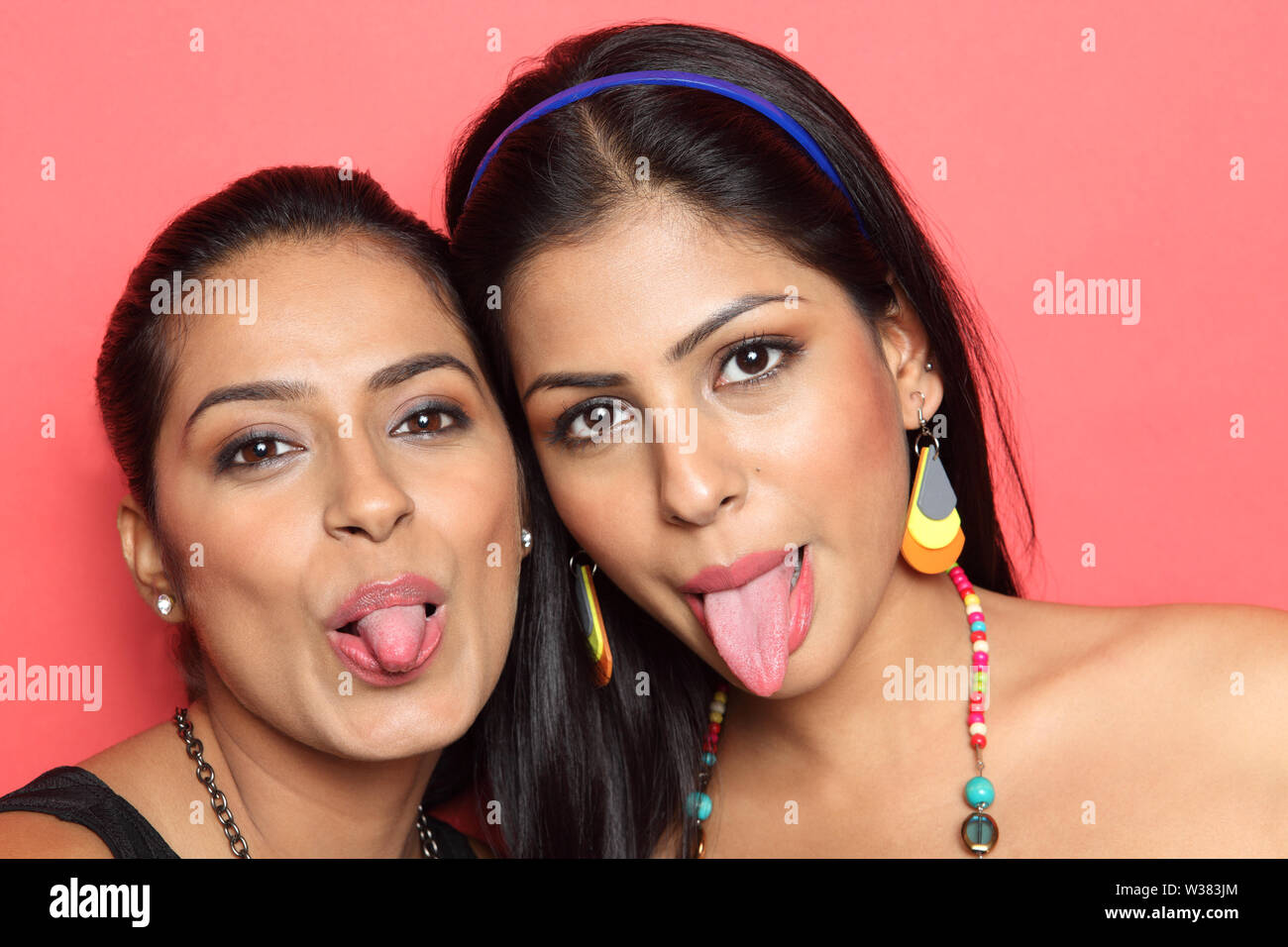 Indian young woman sticking out hi-res stock photography and images - Alamy