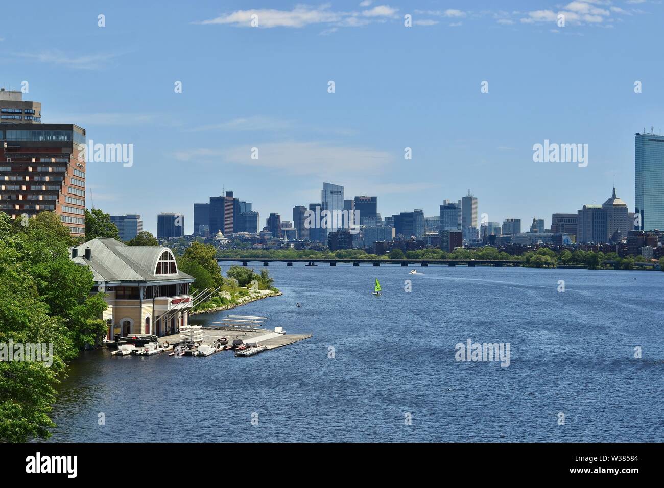 Sailboats sailing in the Charles River Basin with the Boston skyline ...