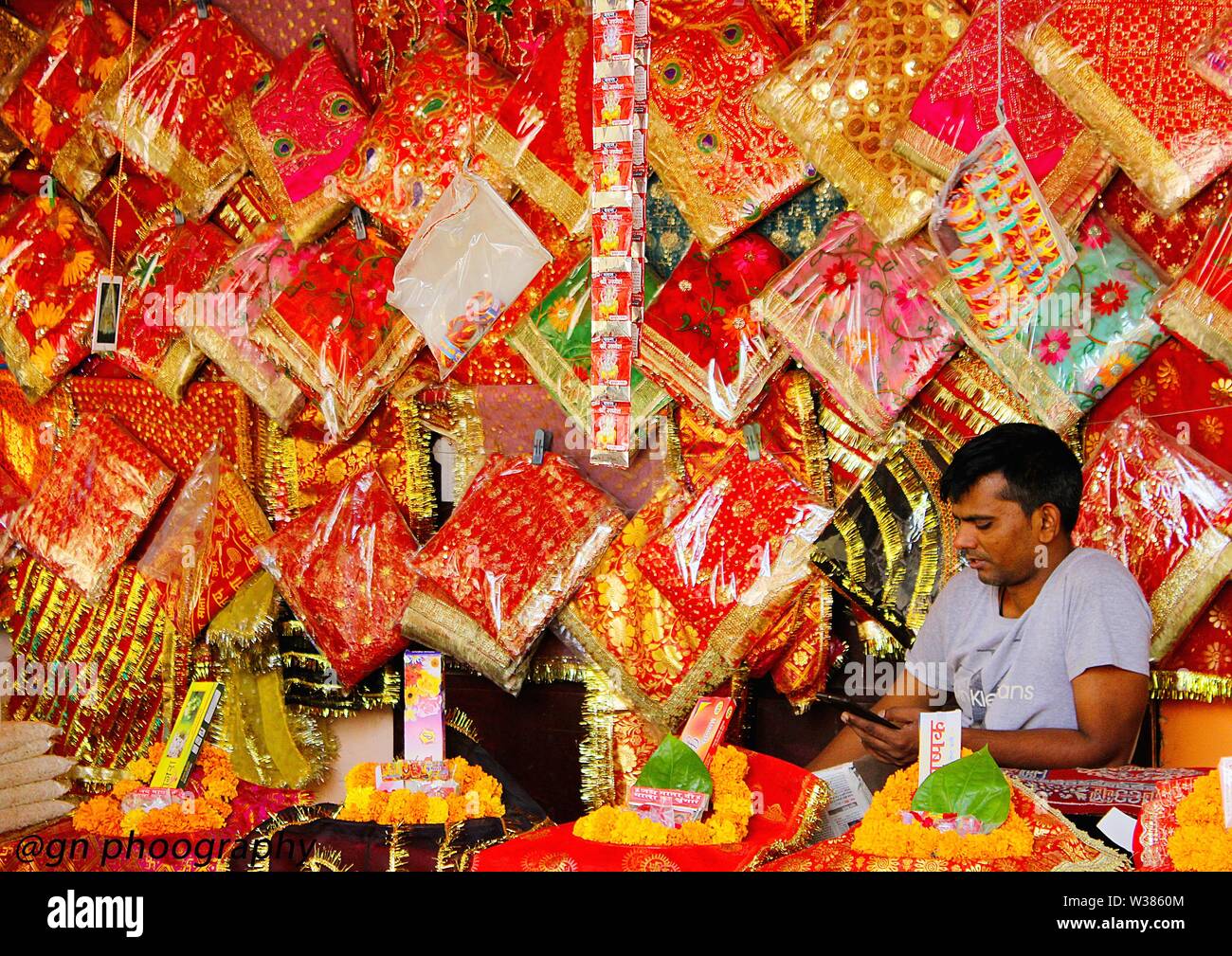 he is a shopkeeper. he sells the cloths of god. these cloths use to ...