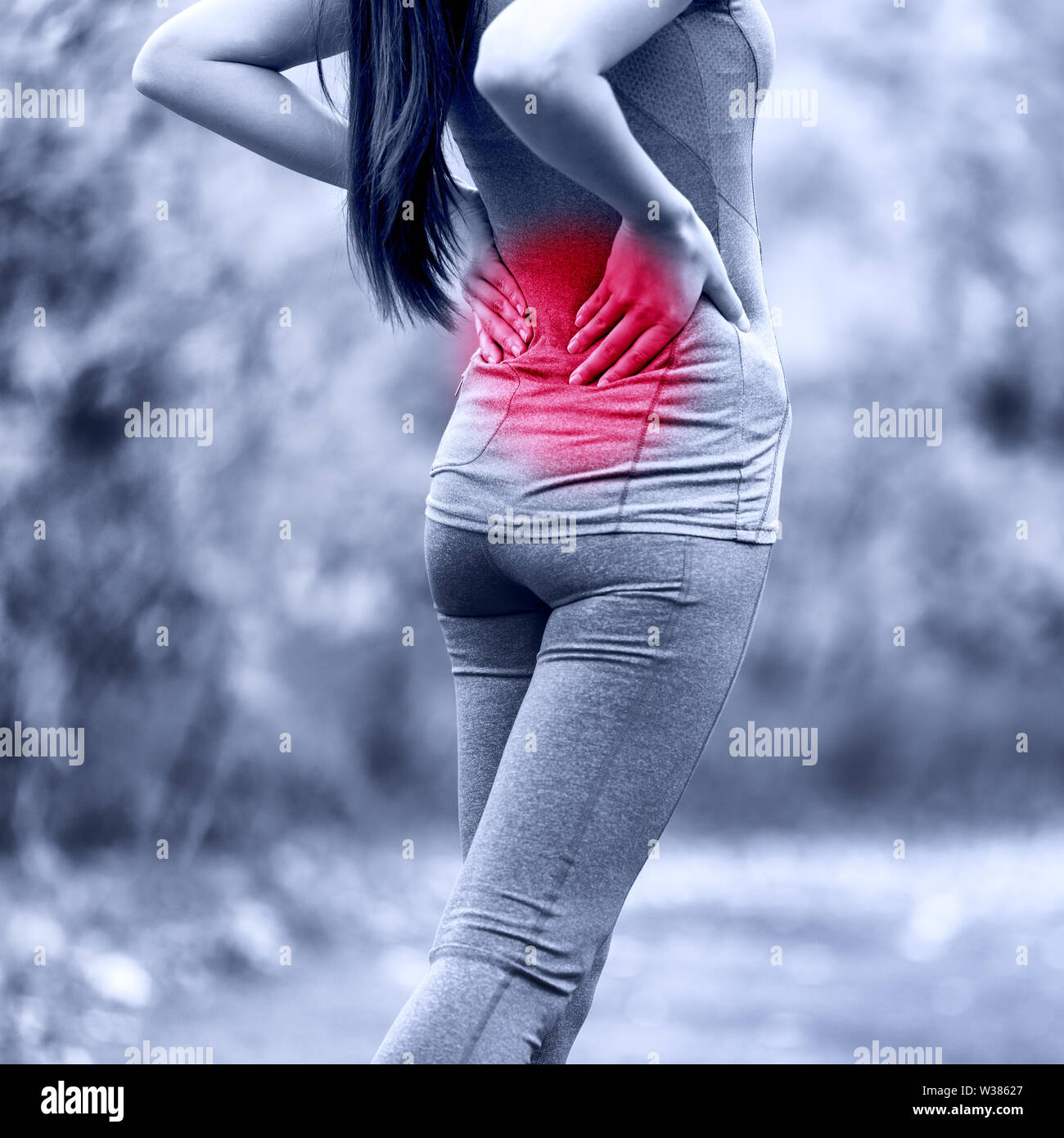 Sport woman hurting back problem - muscle pain injury. Active athlete ...
