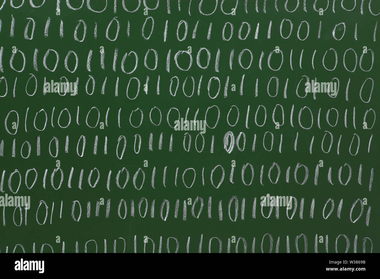 Binary codes on blackboard Stock Photo - Alamy