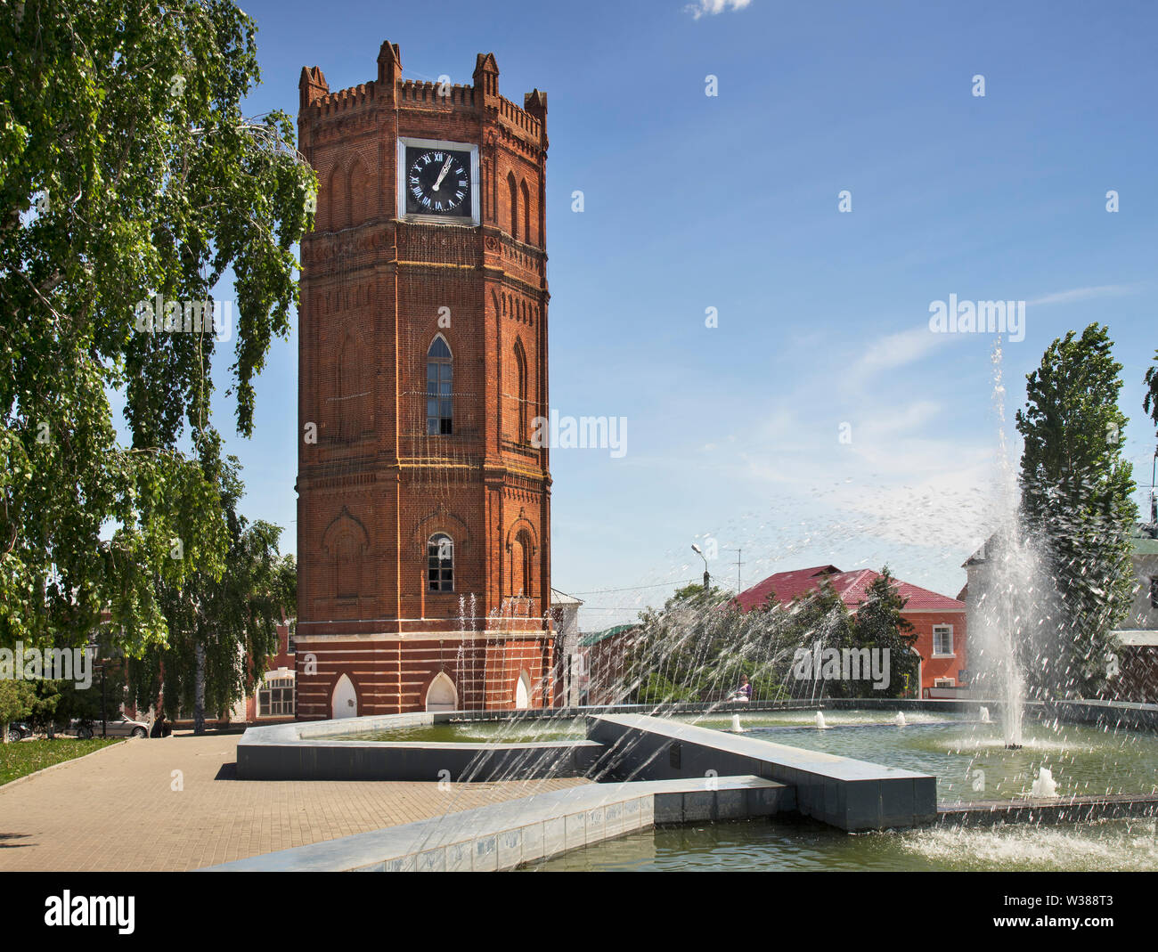 City Clock tower (Yelets Chimes) and Victory fountain in Yelets. Russia ...