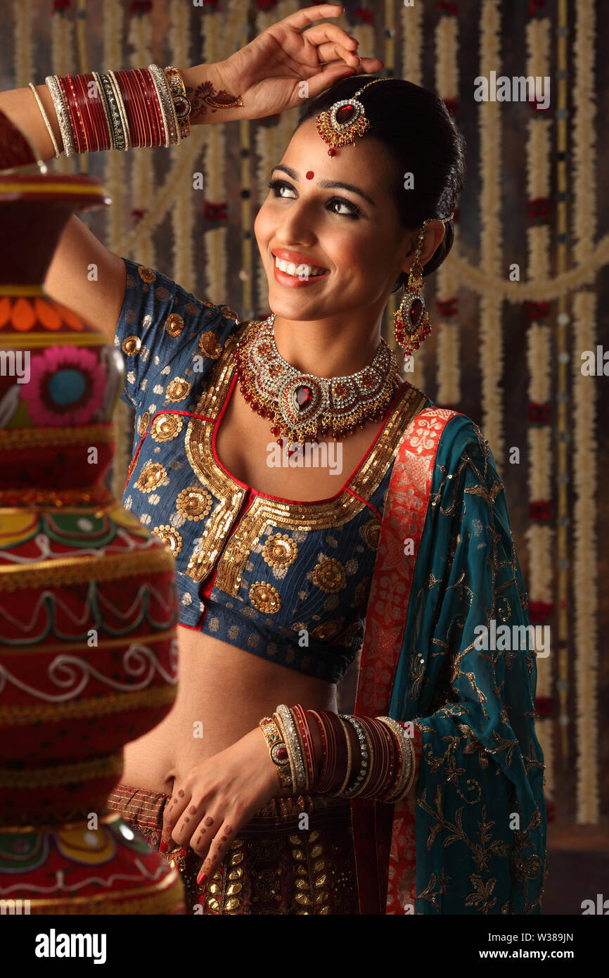 Indian bride smiling Stock Photo - Alamy