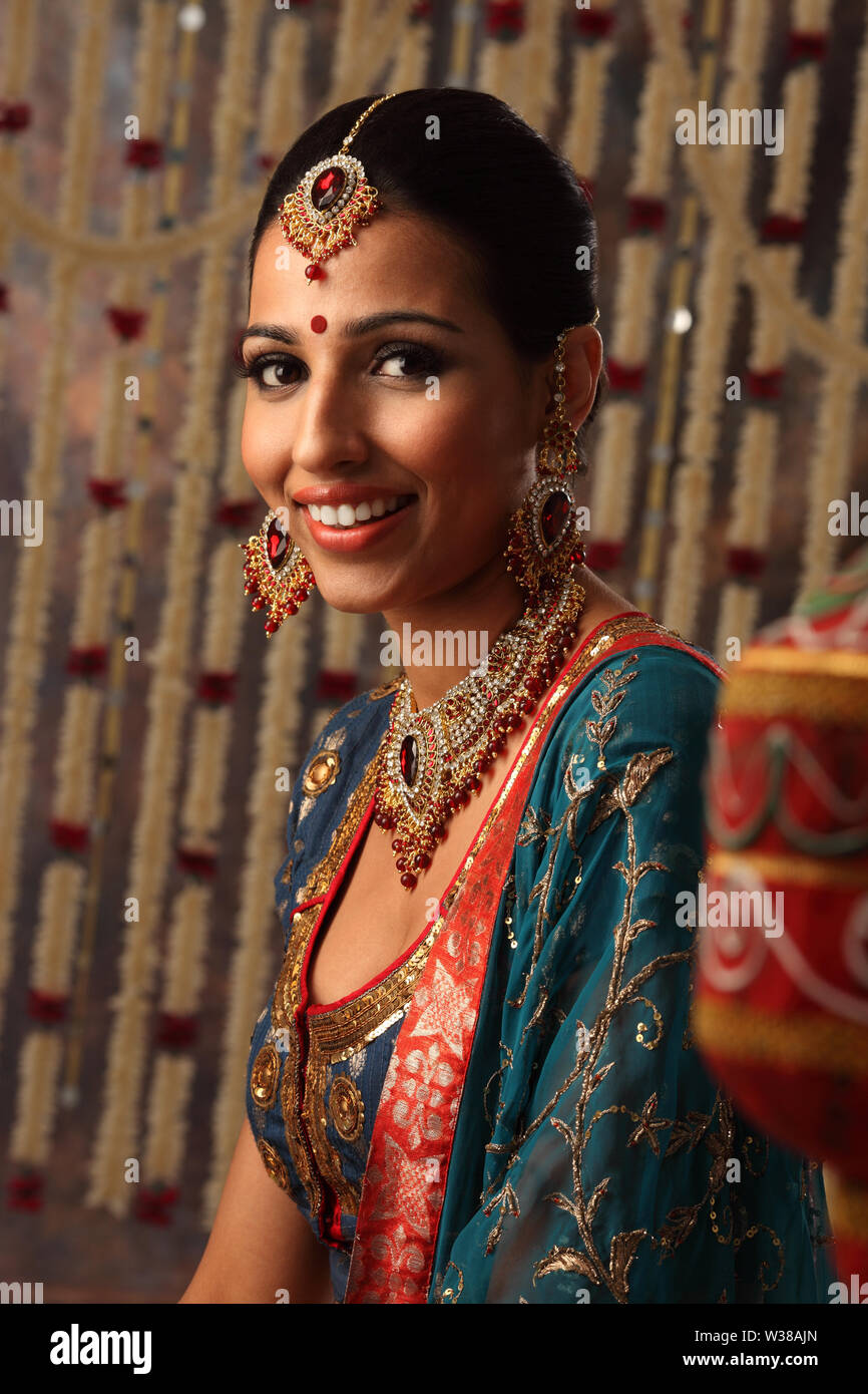 Portrait of an Indian bride smiling Stock Photo - Alamy
