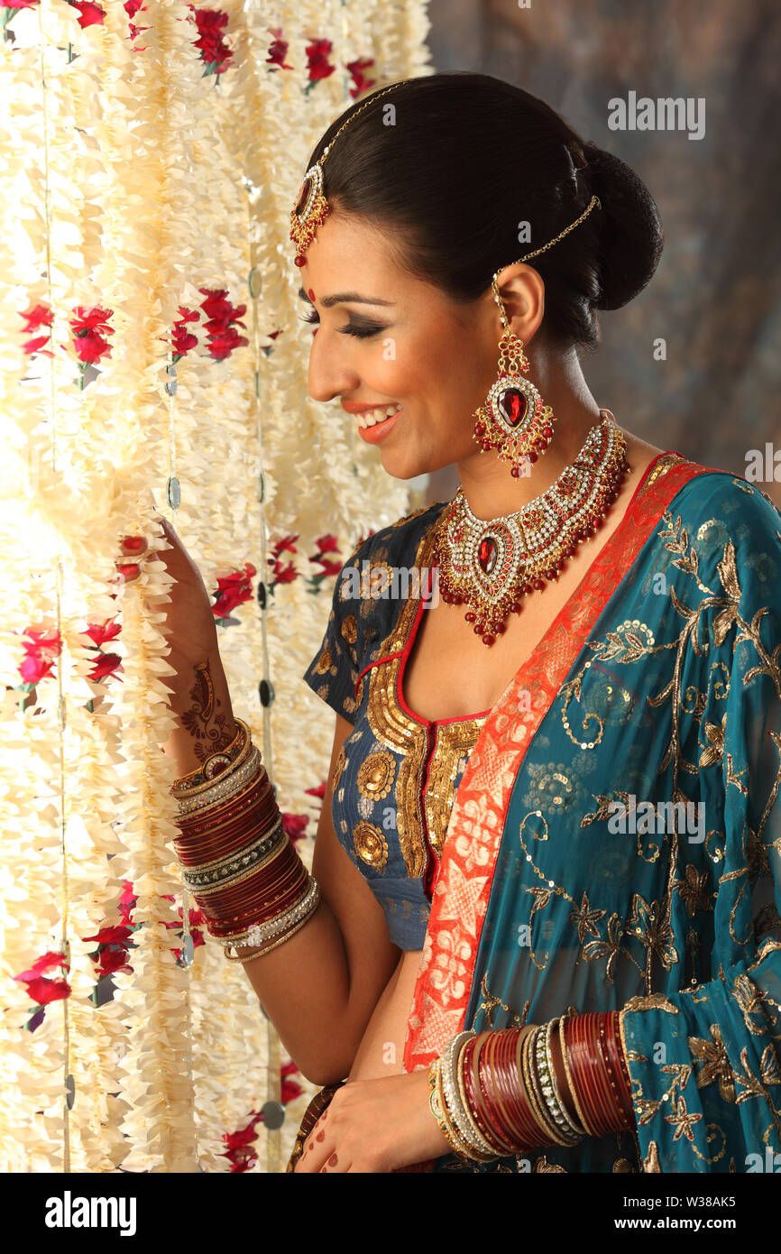 Indian bride smiling Stock Photo - Alamy