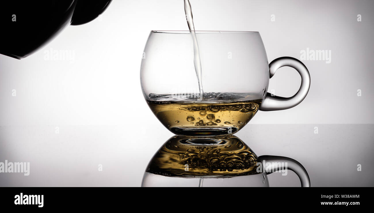 Pouring chai into glass hi-res stock photography and images - Alamy