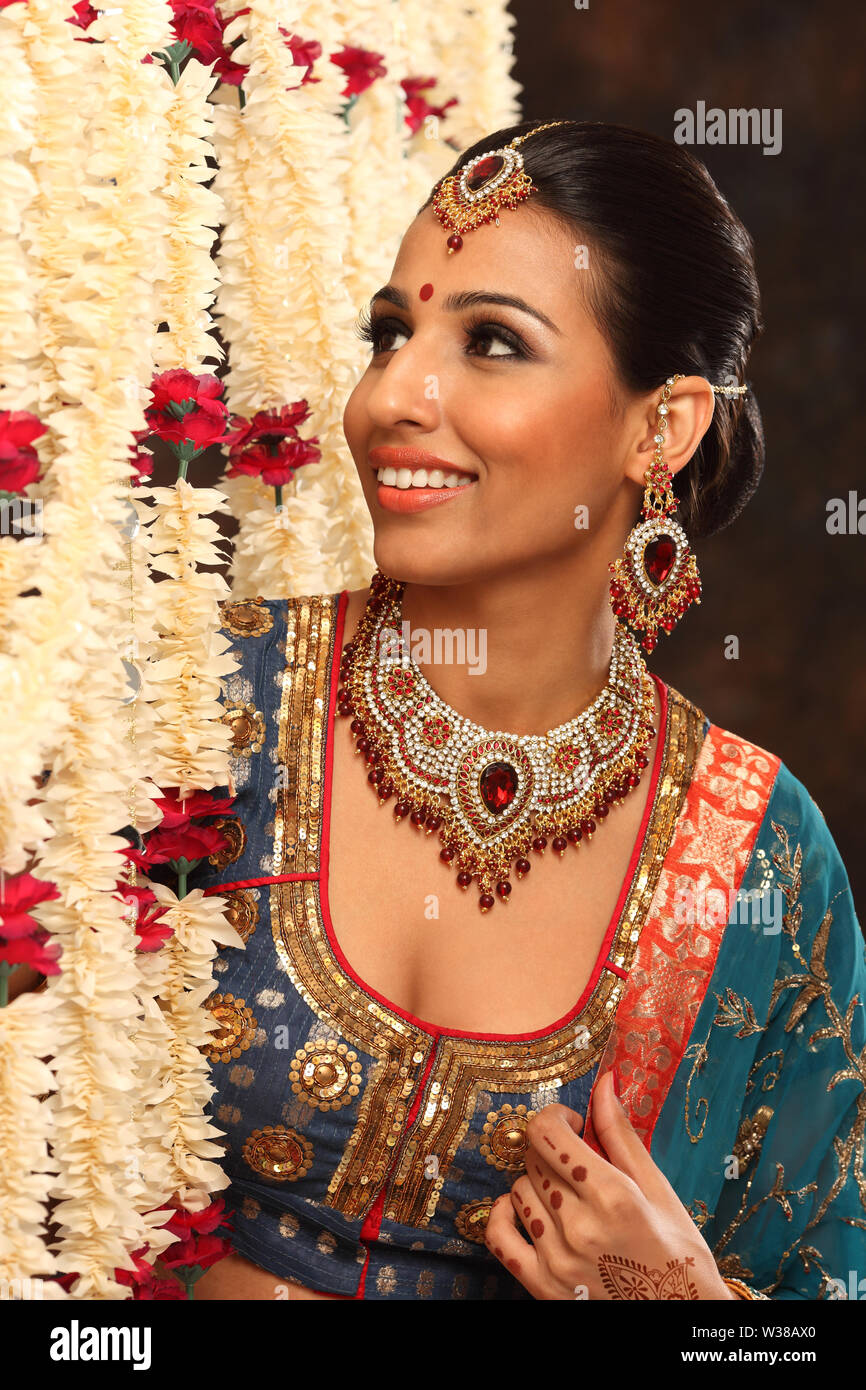 Indian bride smiling Stock Photo - Alamy