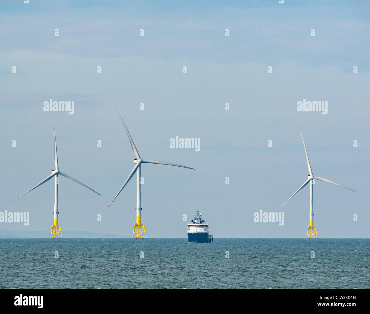 Offshore Wind Farm With Supply Ship High Resolution Stock Photography ...