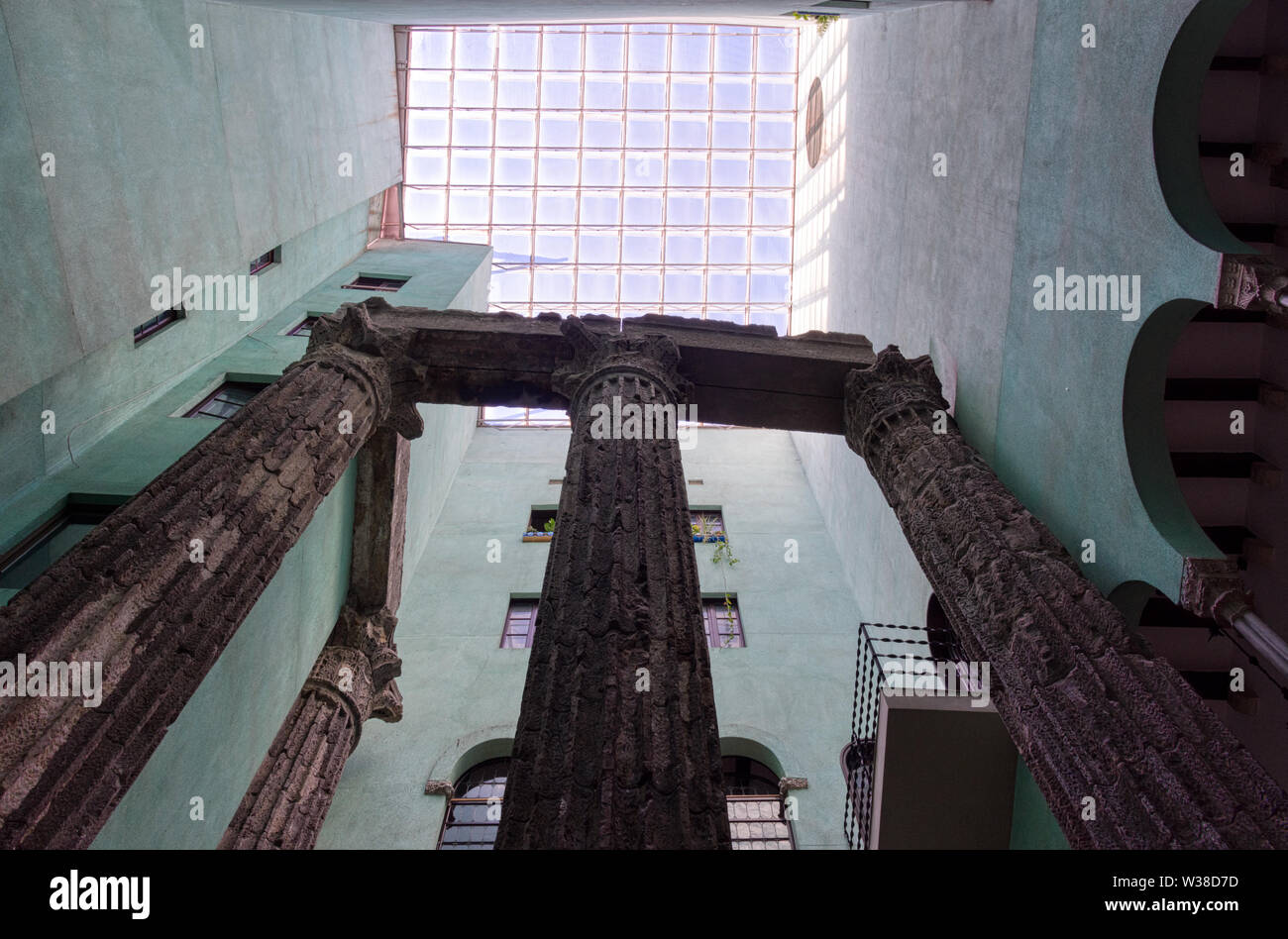Roman columns of the temple dedicated to Augustus in Calle Paradis ...