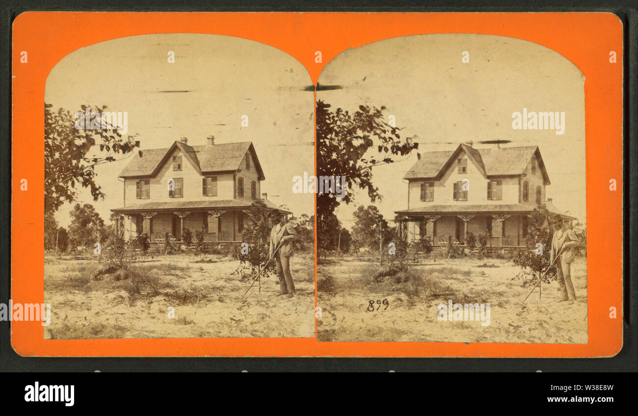 View of a man checking the soil for landscaping, from Robert N Dennis ...
