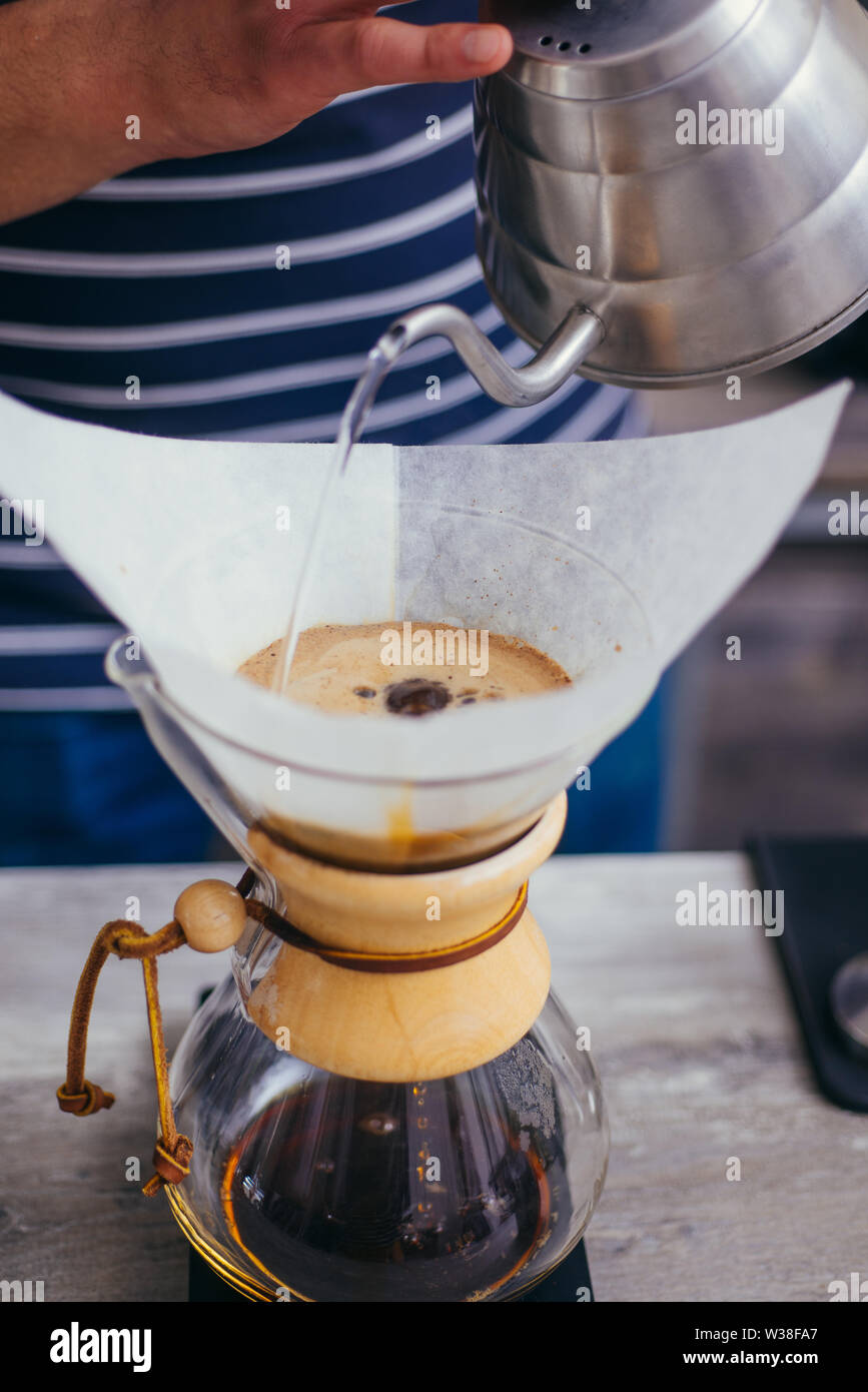 Coffee apron drip brew cafe cafeteria pouring concept Stock Photo - Alamy