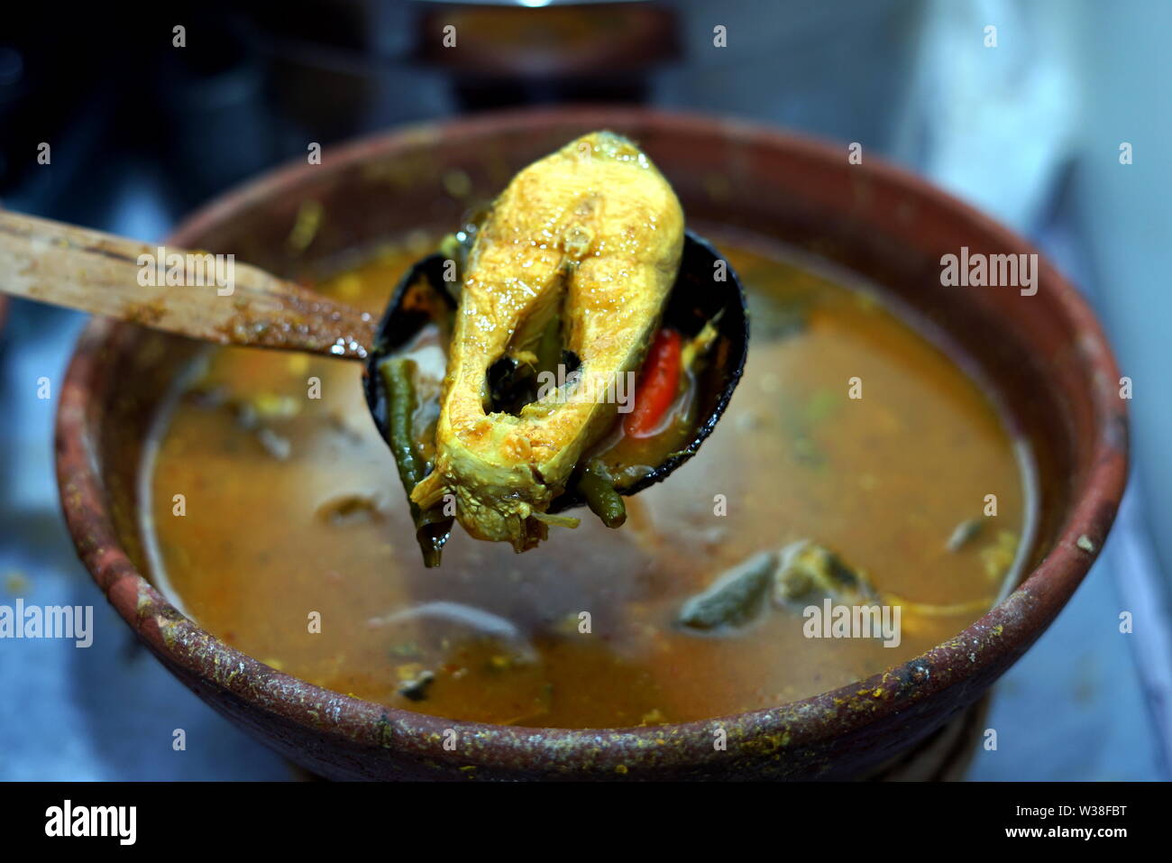 Spicy and hot fish curry Traditional Indonesian food Stock Photo - Alamy