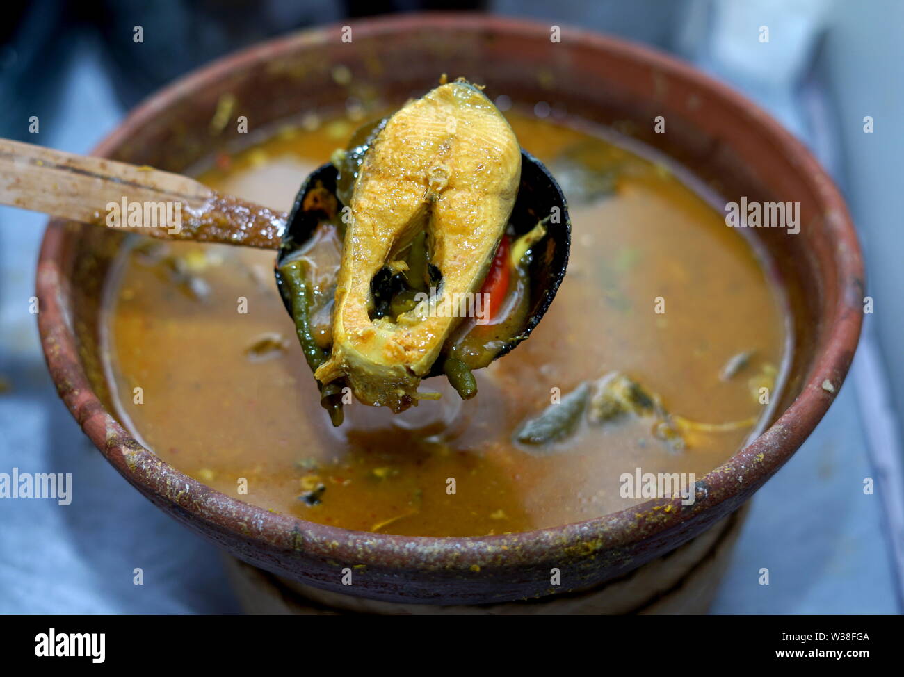 Spicy and hot fish curry Traditional Indonesian food Stock Photo - Alamy
