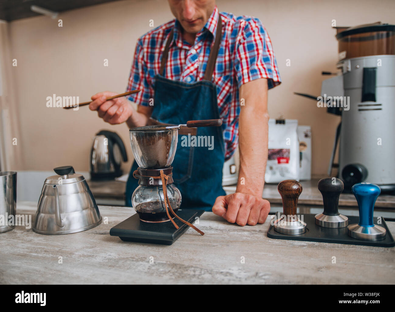 Coffee maker, espresso machine on the table wood Stock Photo - Alamy