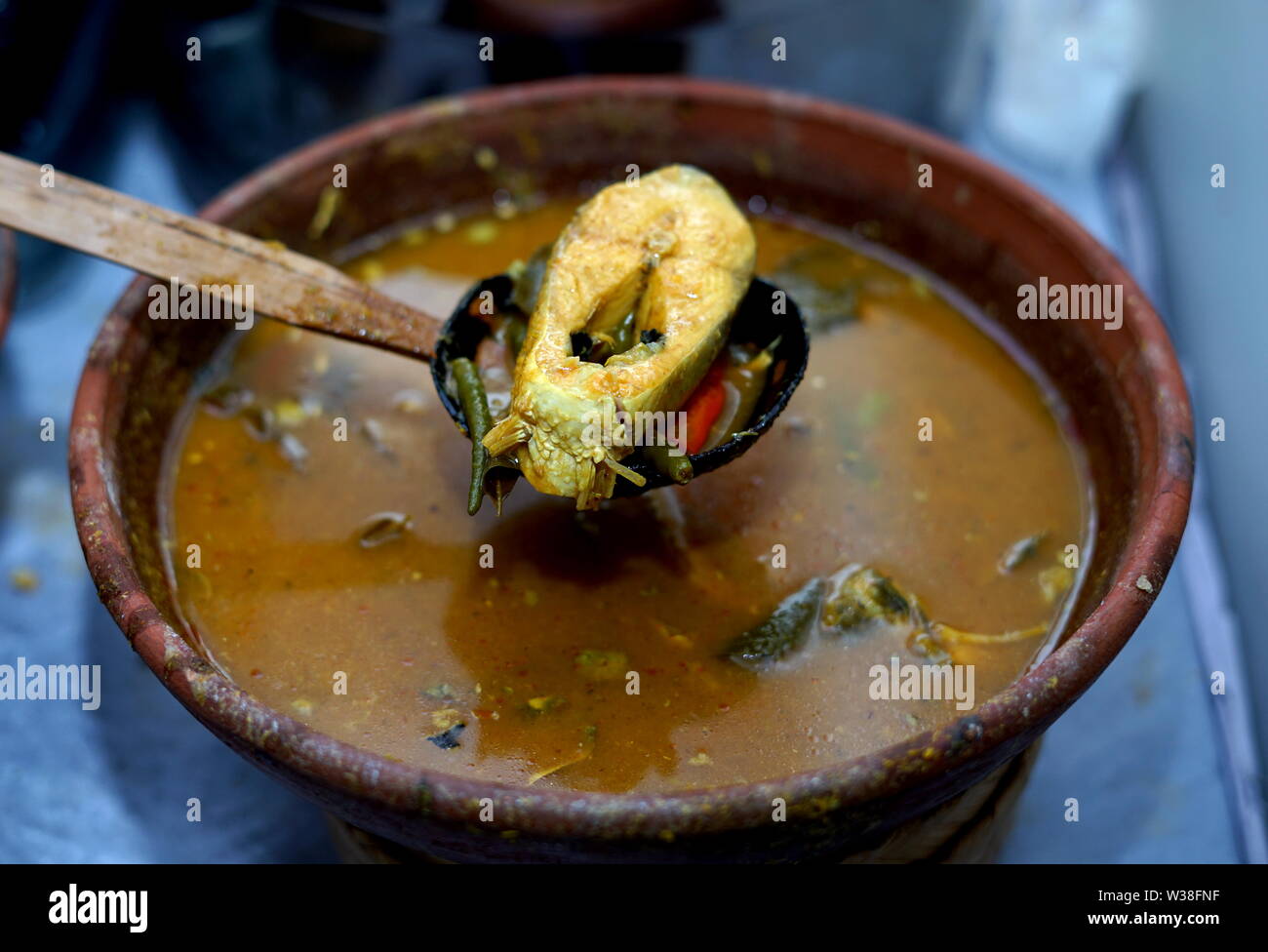 Spicy and hot fish curry Traditional Indonesian food Stock Photo - Alamy