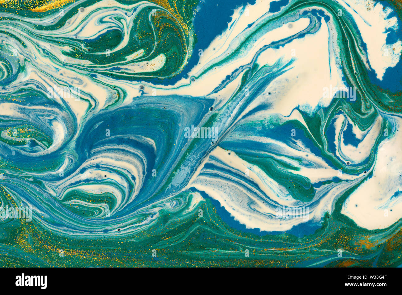 Liquid uneven blue and green marbling pattern with glare of light Stock ...