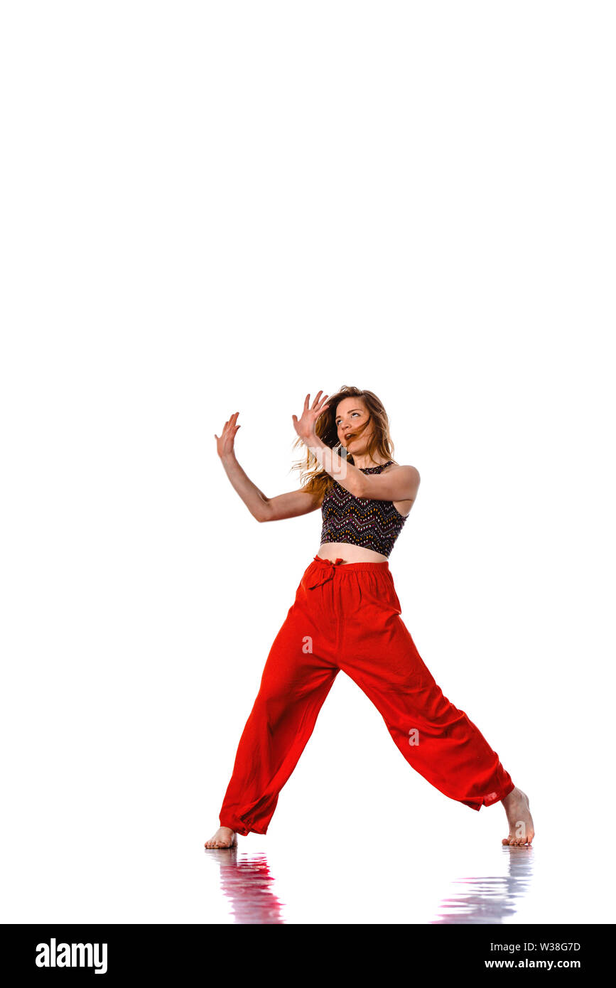 Female dancer perform ballet dance, wearing fashionable clothes Stock ...