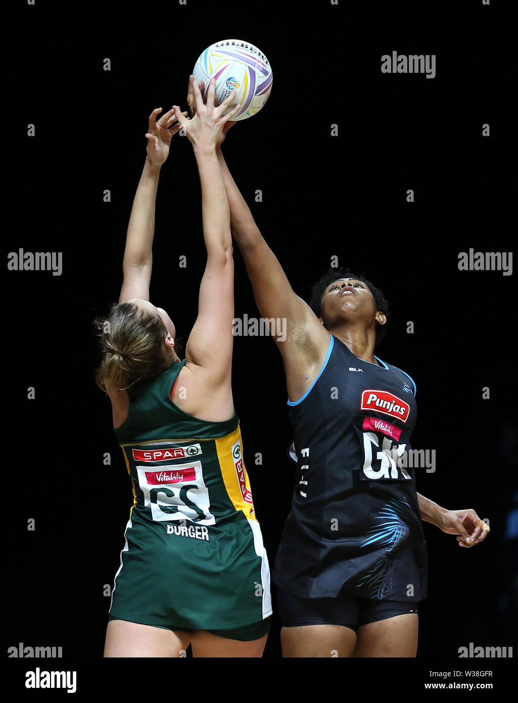 South Africa's Sigrid Burger (left) and Fiji's Episake Kahatoka during ...