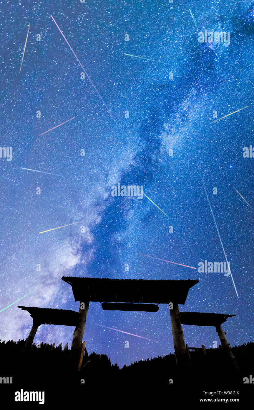 A view of a Meteor Shower and the Milky Way with wooden entrance door ...