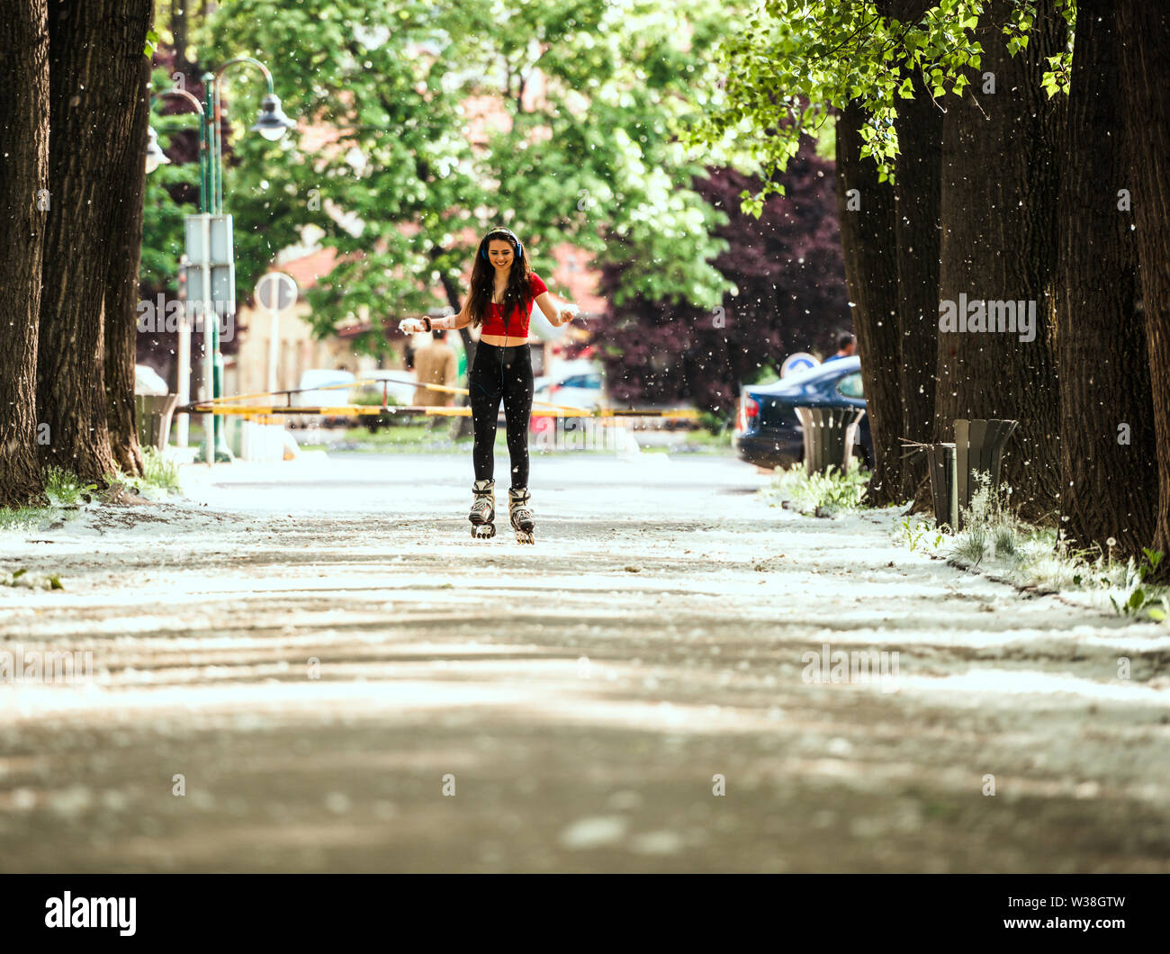 Teenage girl on roller skates at summer. Inline skates sport conceptual ...