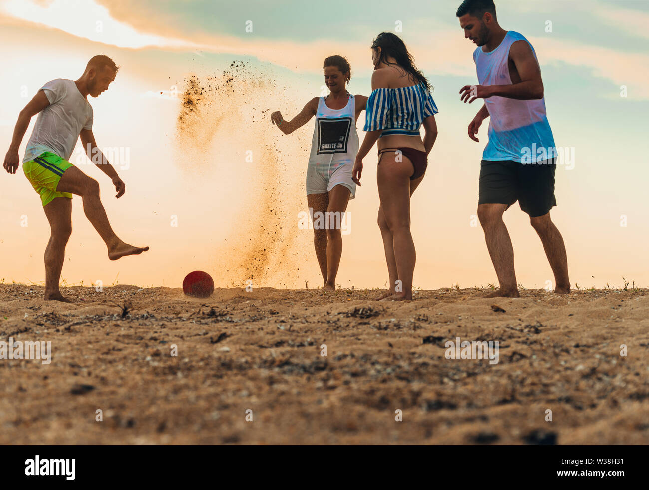 Group friends posing soccer hi-res stock photography and images - Alamy