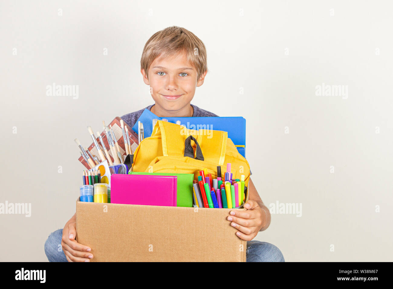 Child donating books hi-res stock photography and images - Alamy