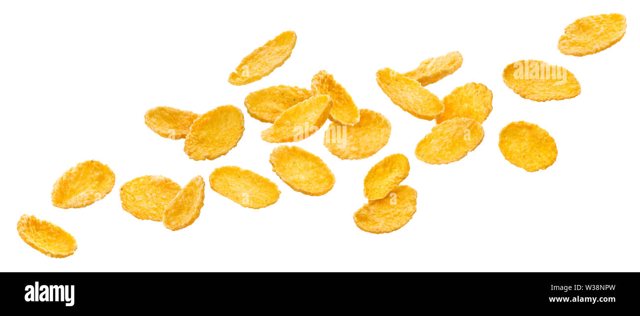 Falling corn flakes, traditional breakfast cereal isolated on white ...