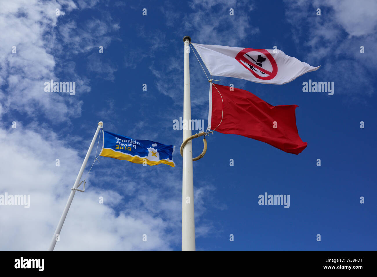 Flags in strong breeze hi-res stock photography and images - Alamy