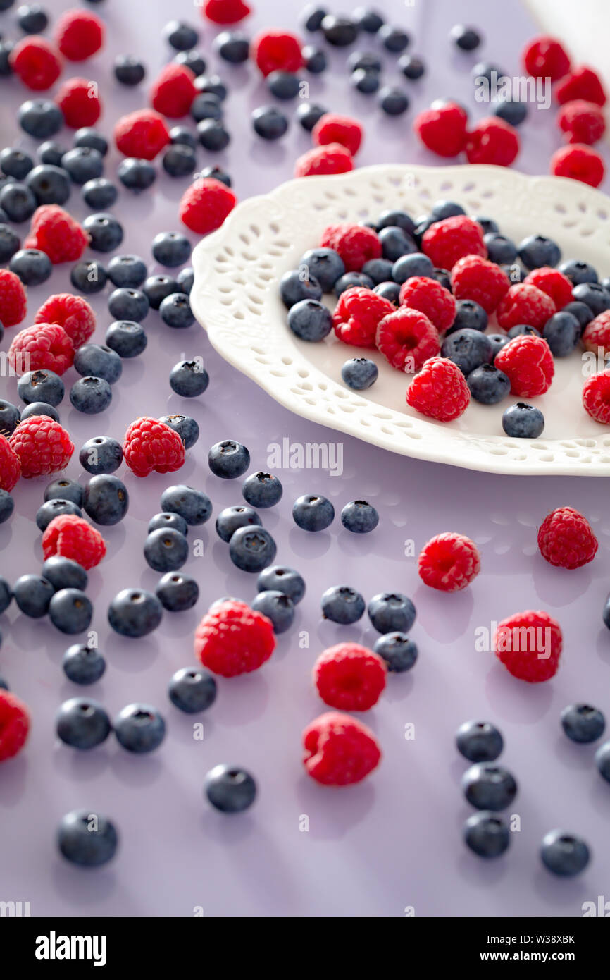 Seasonal fruits, blueberry and raspberry Stock Photo - Alamy