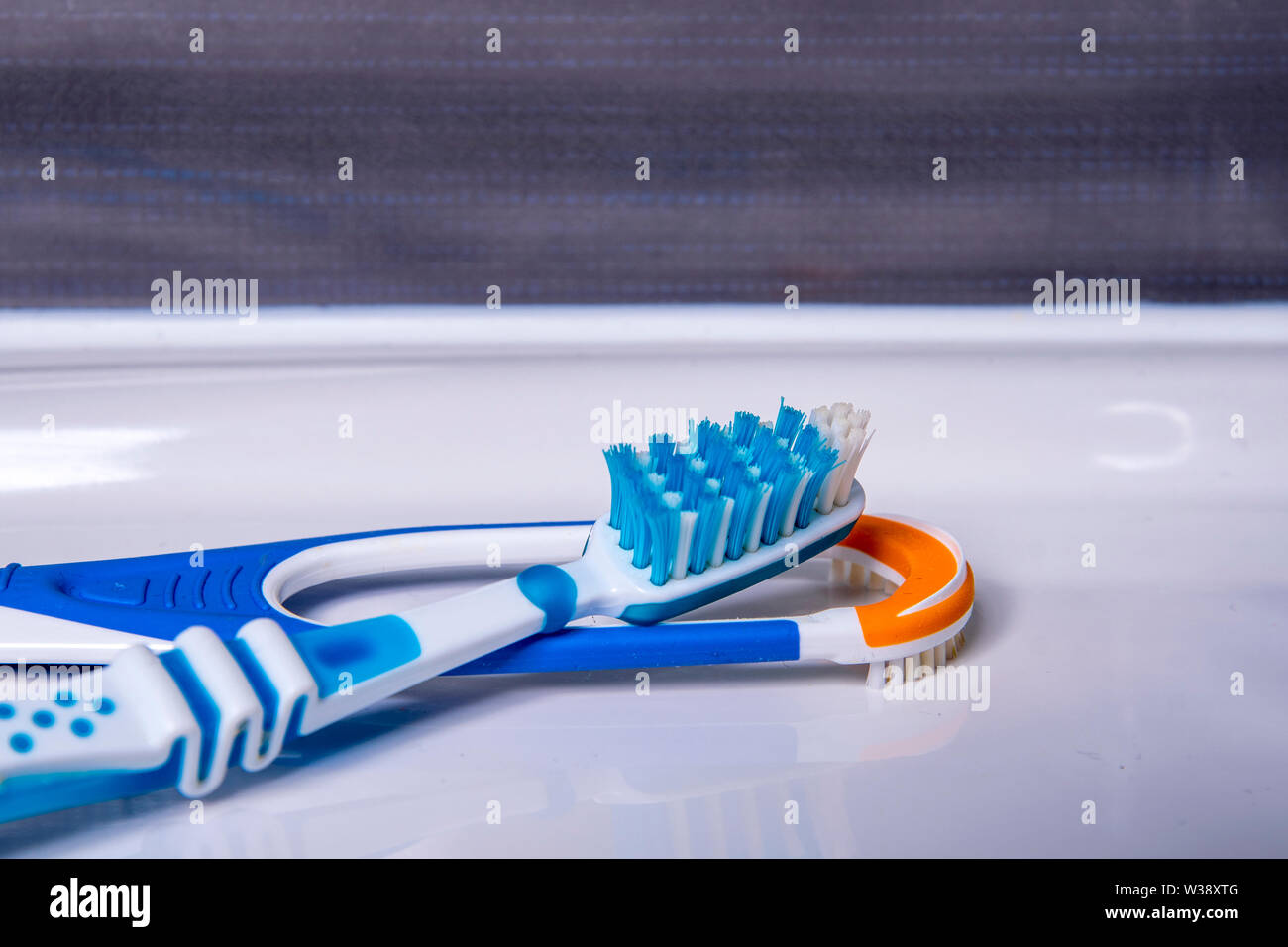 bathroom with toothbrush and tongue cleaner Stock Photo - Alamy