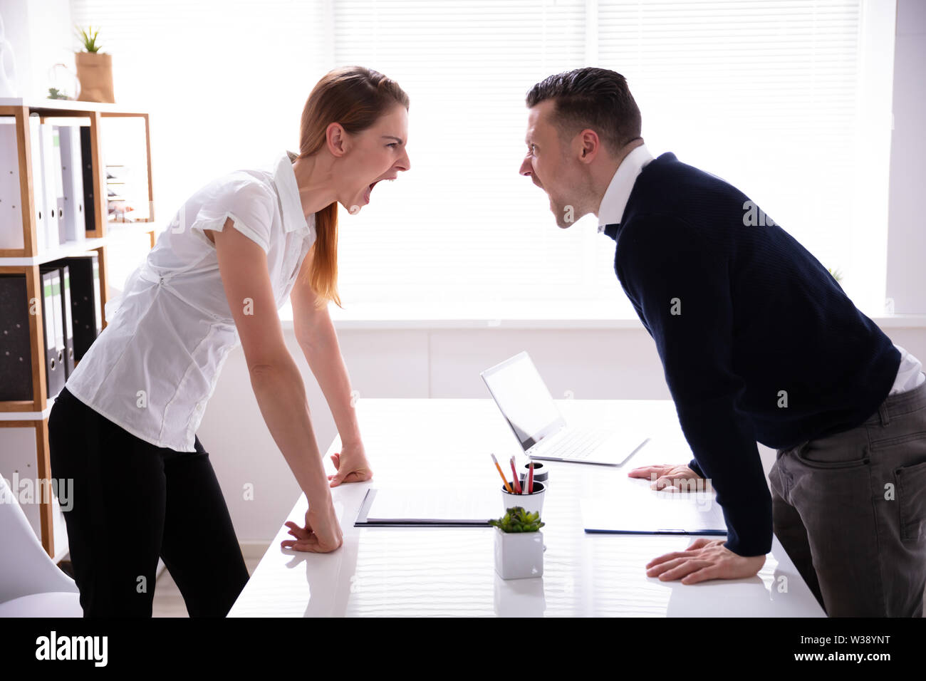 Two People Yelling At Each Other