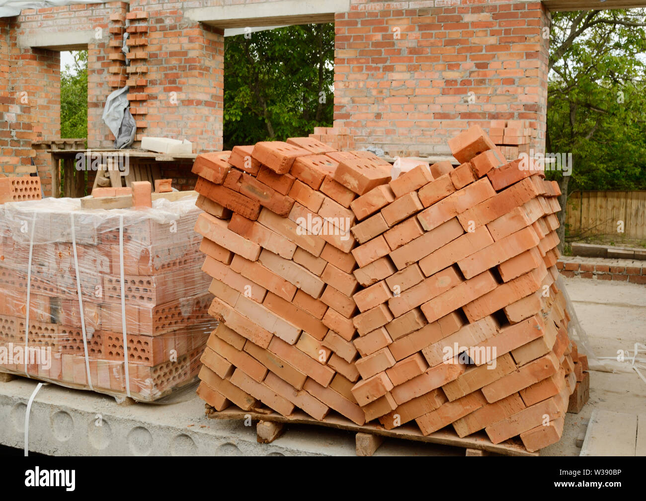 Stack of bricks on the construction territory Stock Photo - Alamy