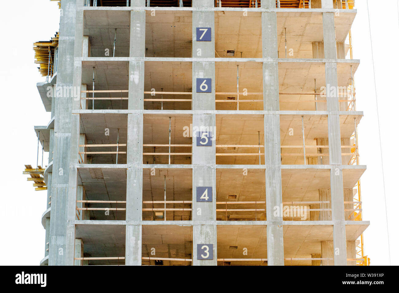 Modern building under construction detail, concrete frame, window ...
