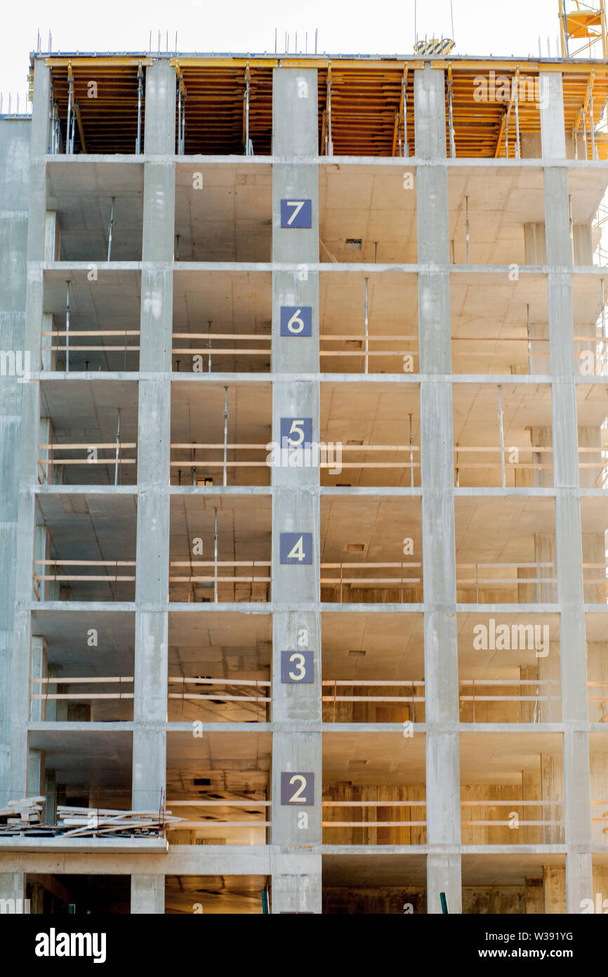 Modern building under construction detail, concrete frame, window ...