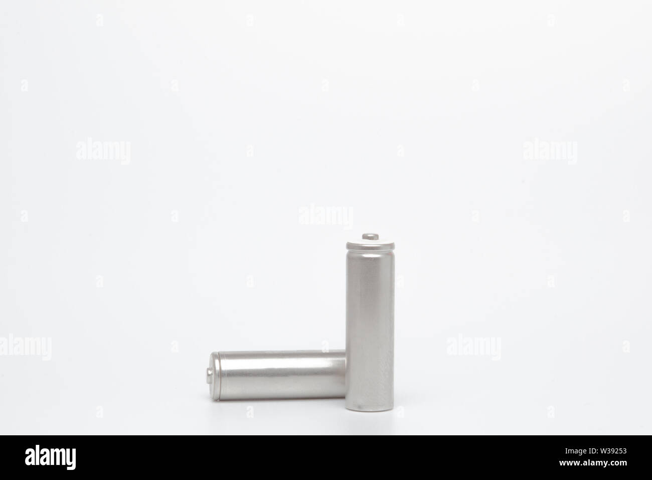 Close up grey AA batteries over white background with clipping path ...