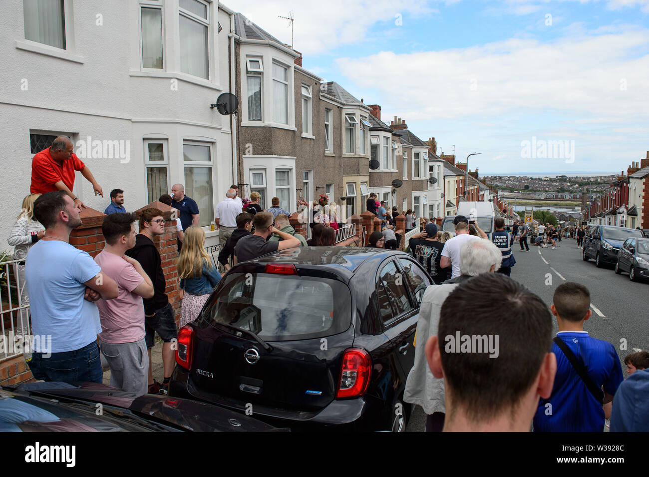 Barry, UK. 13th July, 2019. Crowds gather to watch the filming of the ...